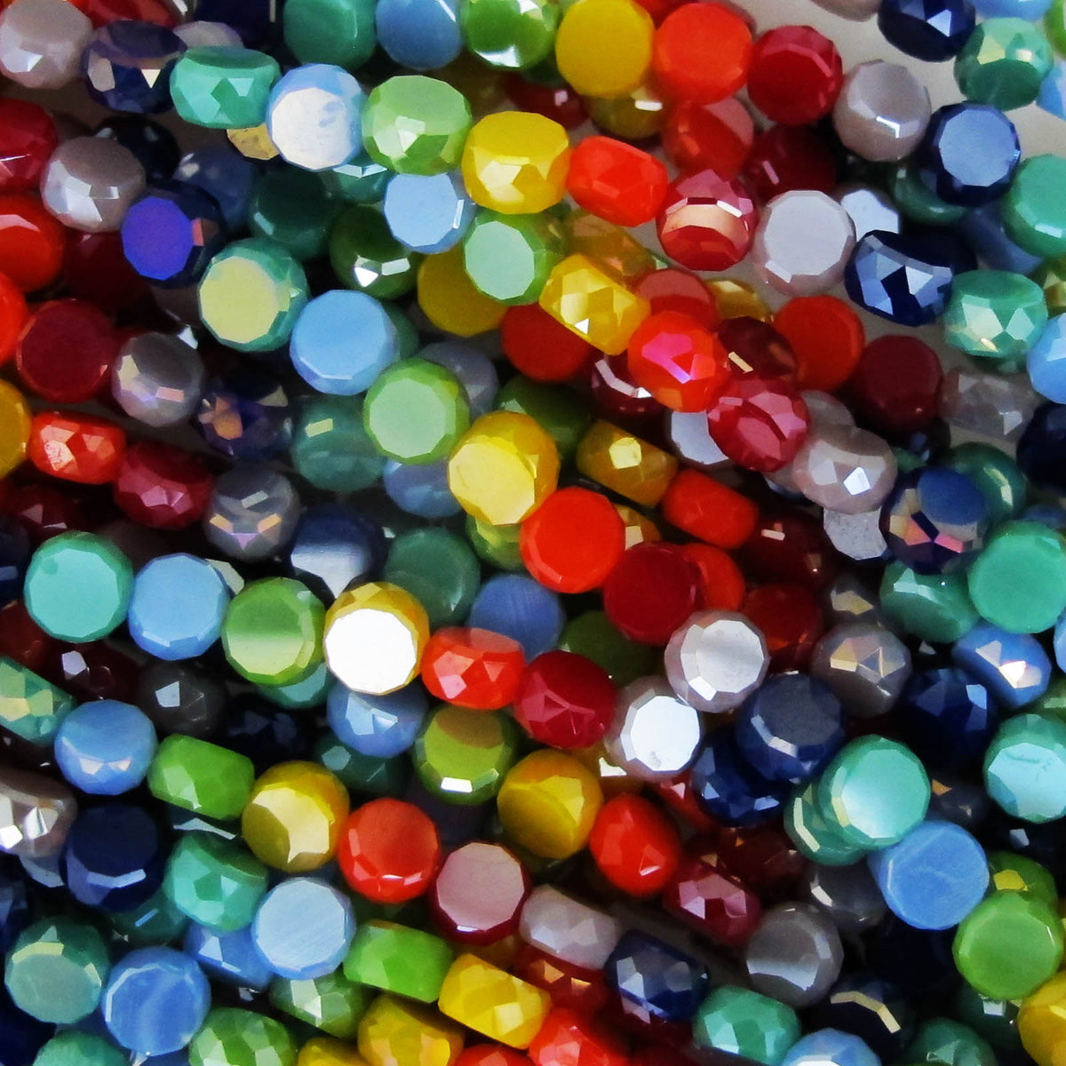 Cg 6mm coin faceted Rainbow 32pcs – Wholesale Beads